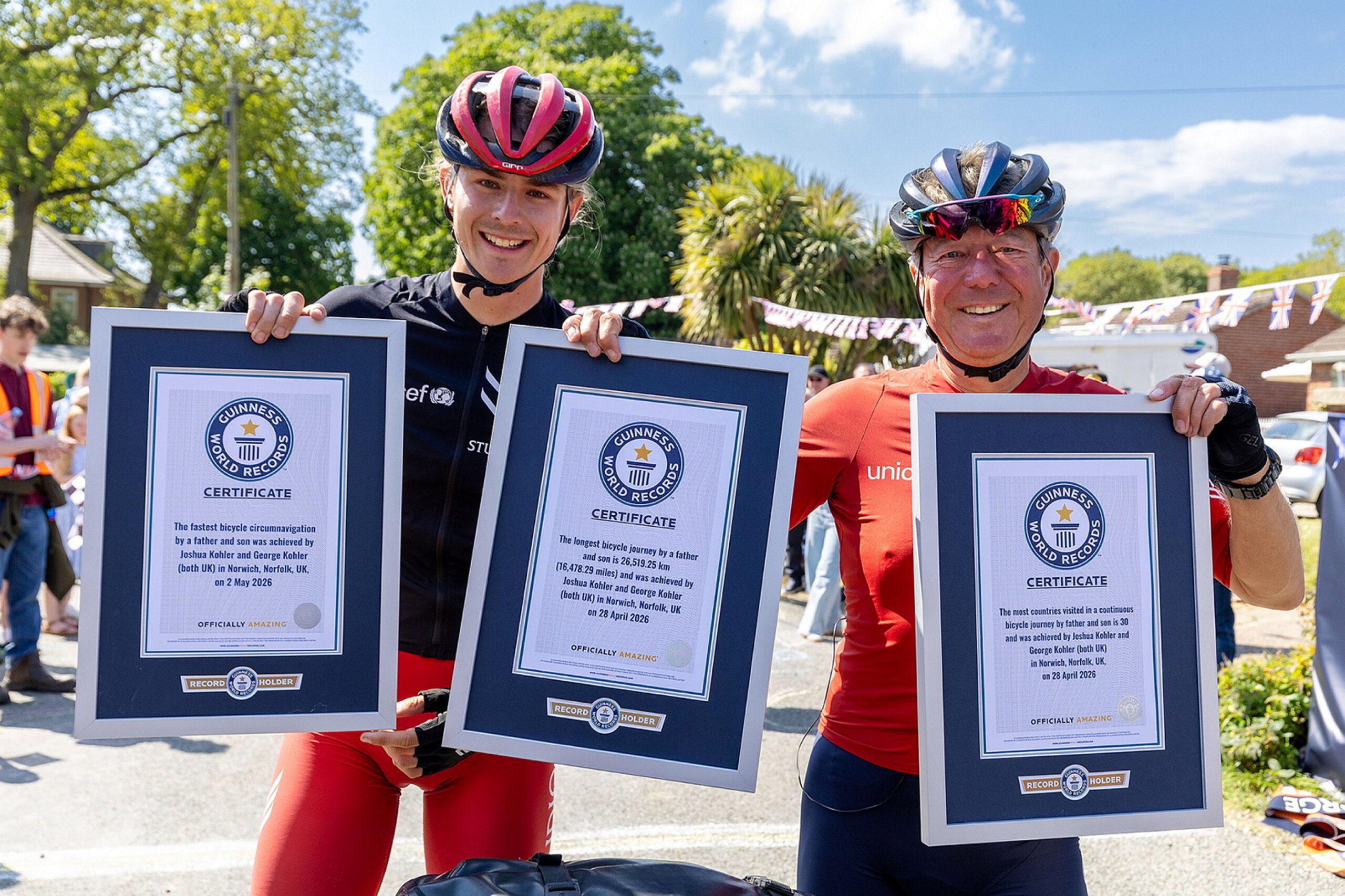 Father and son break world records after 18,000-mile cycle around the world