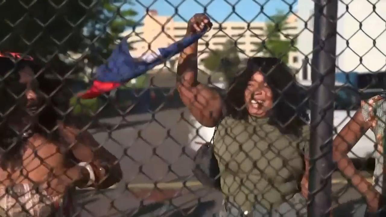 Moment: No Haiti, no party - fans dance with players at airport