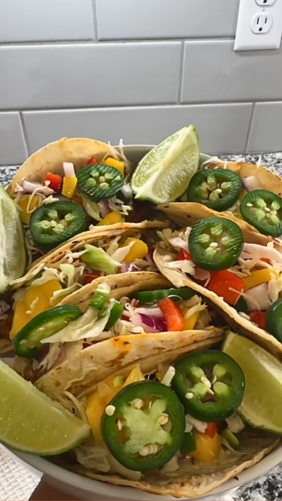 Shrimp tacos with mango salsa crema