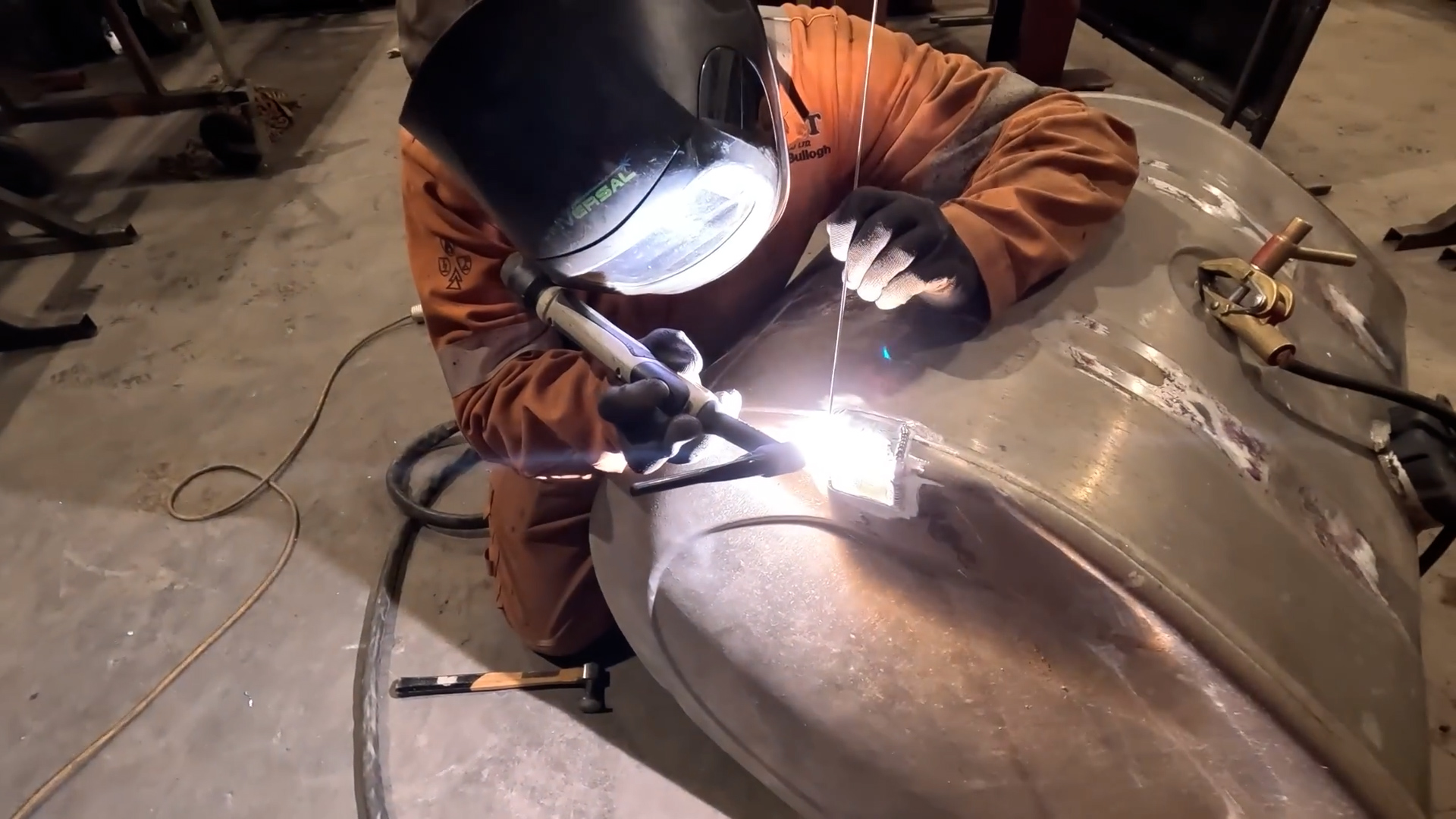 Precision TIG welding repair on heavy equipment component