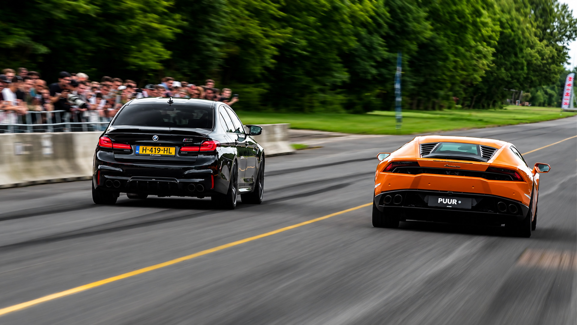 Lamborghini Huracan battles BMW M5 in drag race