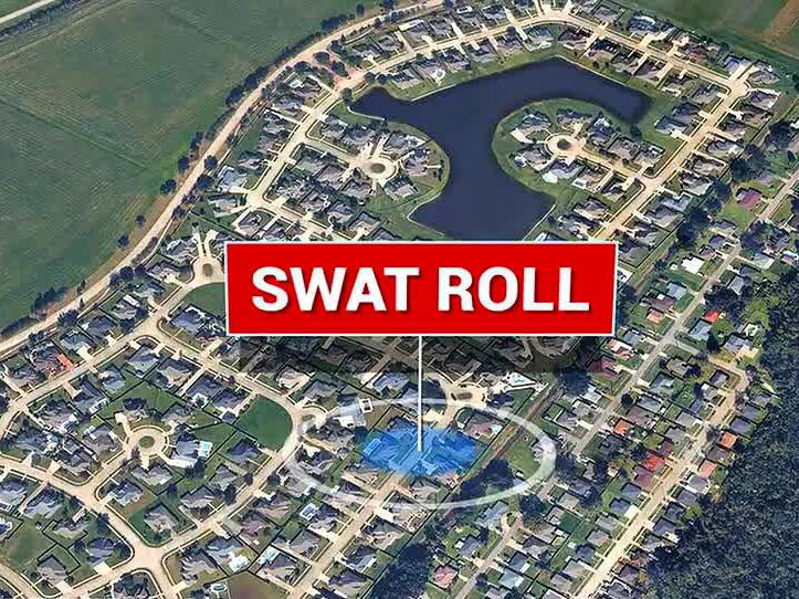SWAT team executing arrest warrant in Luling