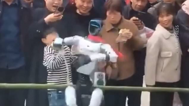 Kid finds himself in robot's slap zone