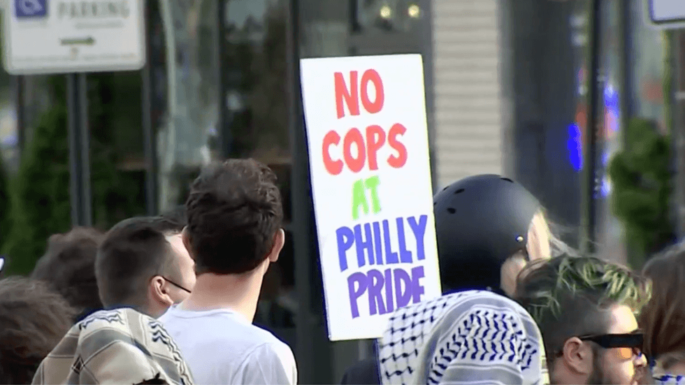 Protesters rally after 15 people arrested during Pride celebrations in ...
