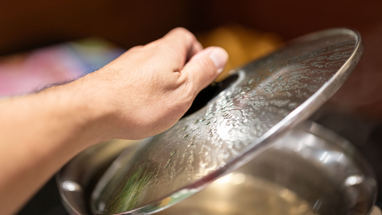 Never toss an old pot lid: Here's a clever way to use it for garage storage