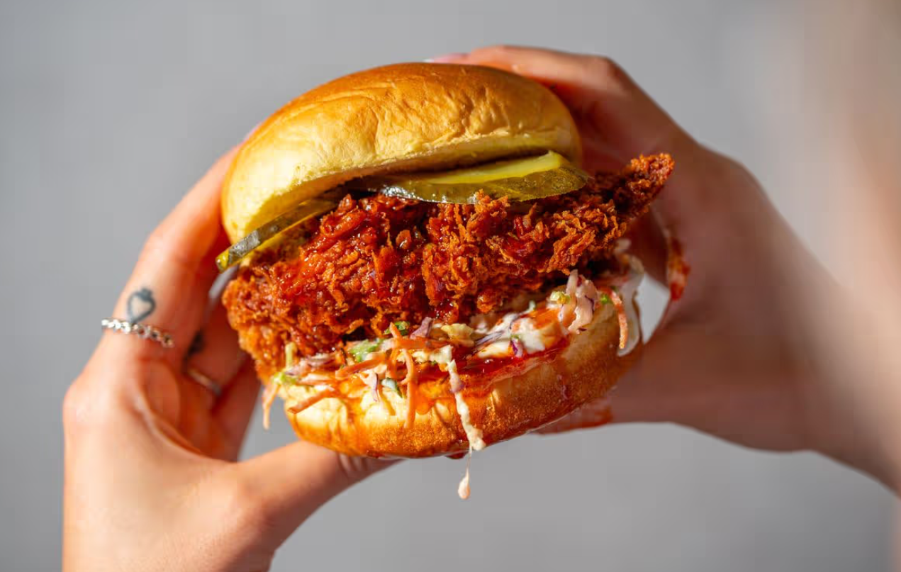 Crowds gather for SIDES hot chicken restaurant opening at St Enoch Centre