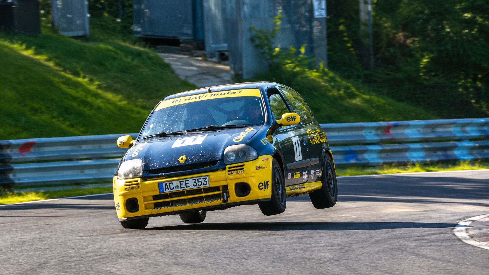 Small hatchback goes onto two wheels after pushing hard mid-corner