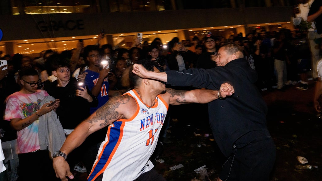 Violence erupts near Knicks watch party with fans fighting, climbing ...