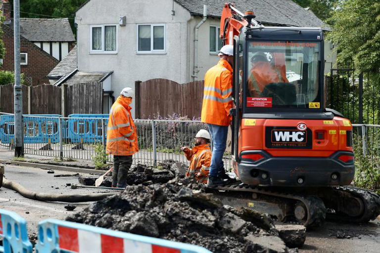 Severn Trent dig up shut road as businesses issue 'we're open' message