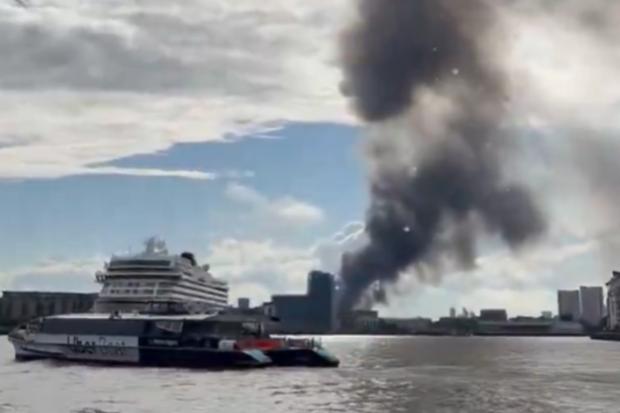 Man treated after huge fire breaks out at recycling centre in south ...