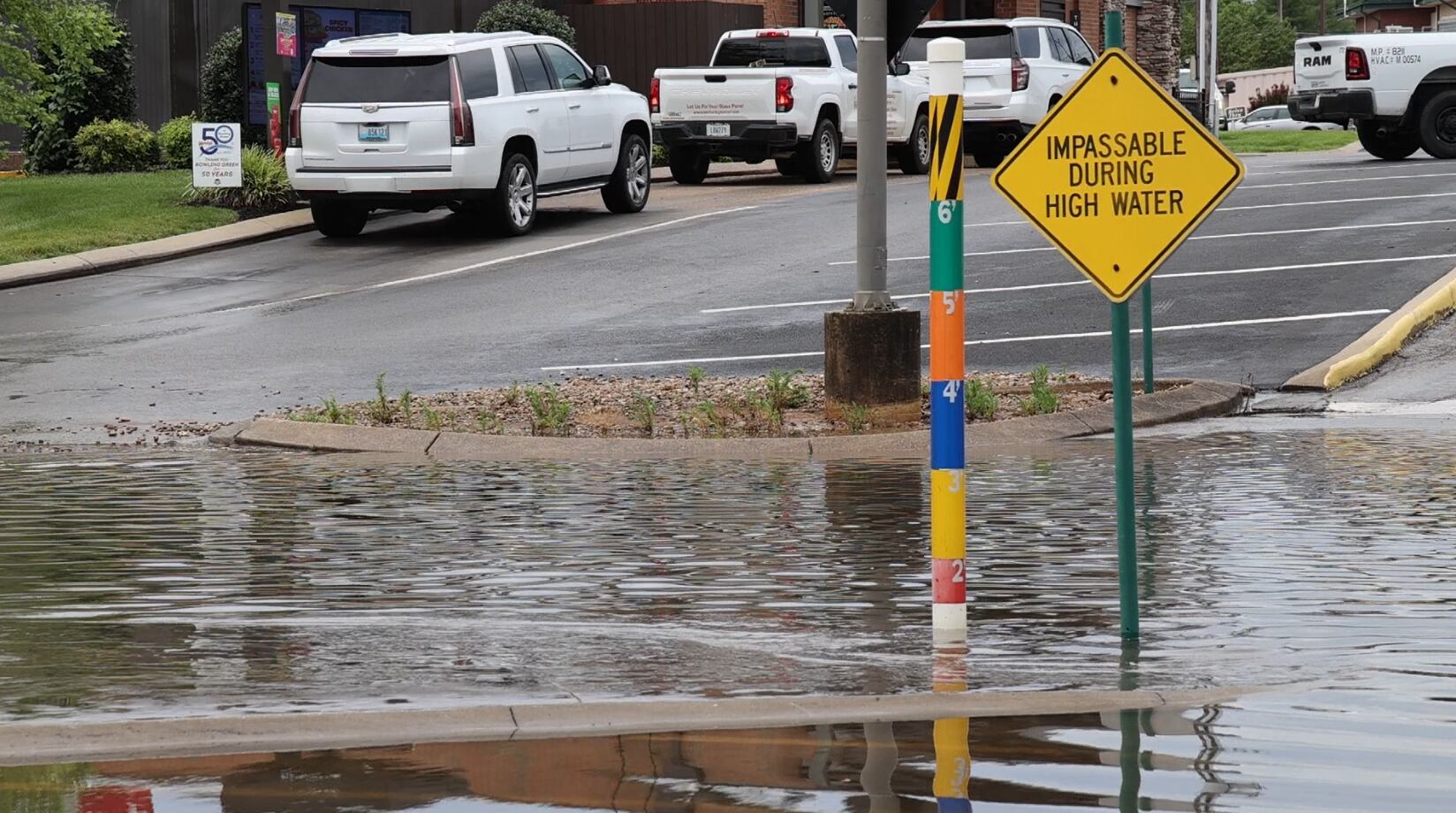 Flash flooding creates dangerous road conditions as heavy rain eases ...