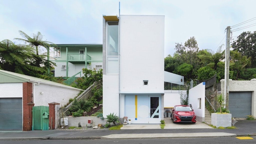 He turned a crumbling garage into a 3-story dream home