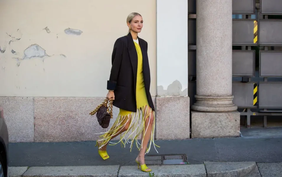 'Black suit and yellow dress' trend blends style and symbolism