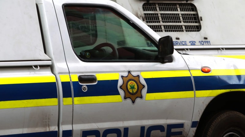 Three arrested after axe attack on police officer