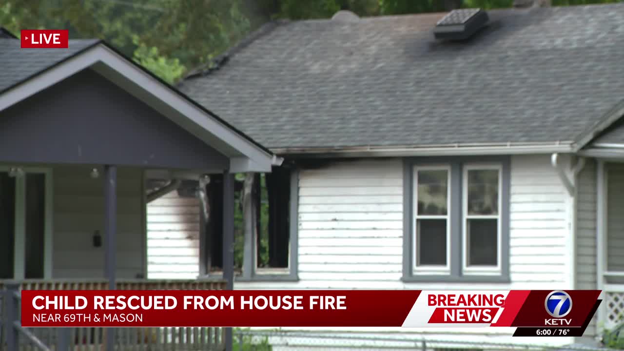 Omaha police rescue child from fire
