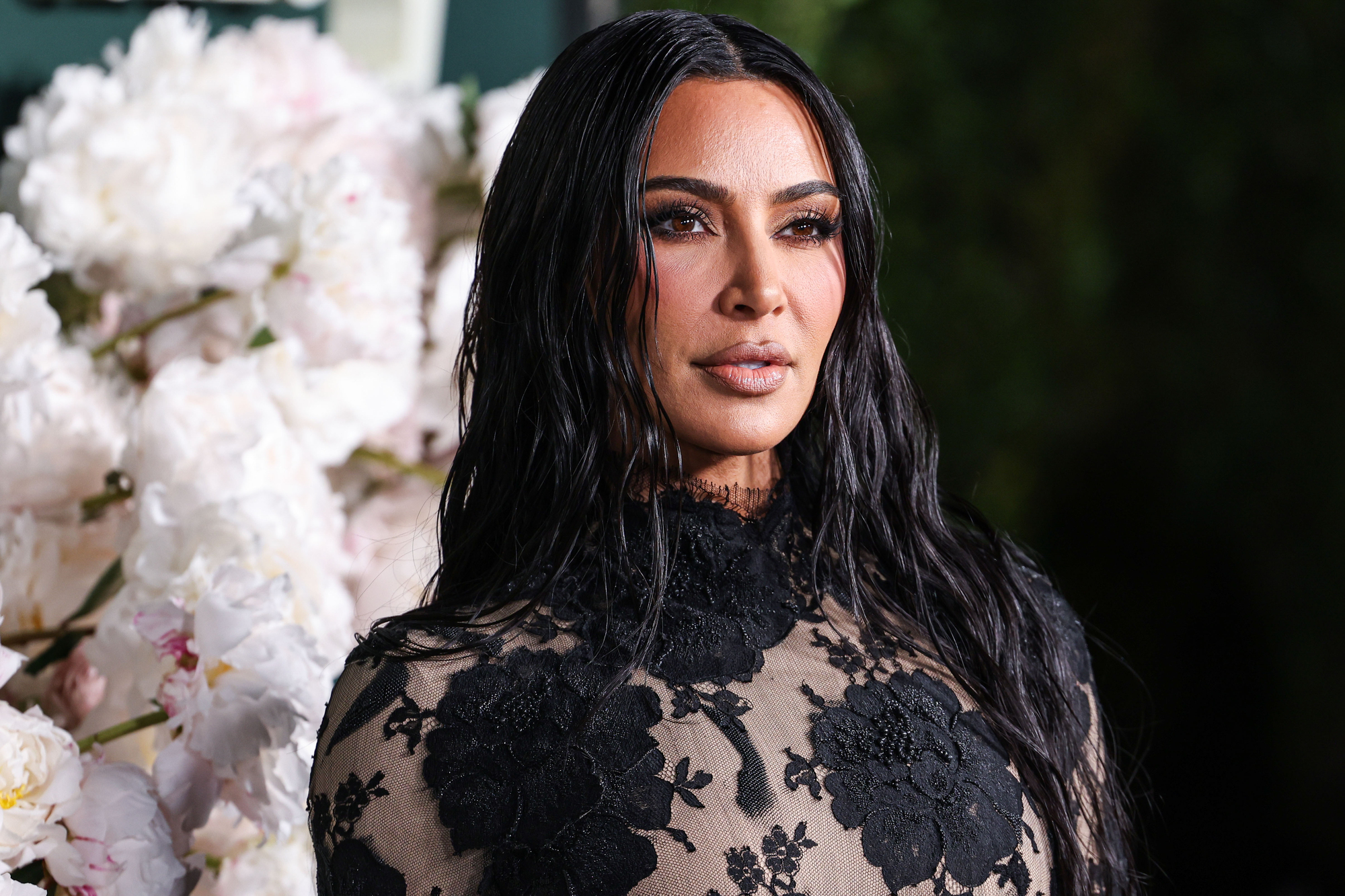 Kim Kardashian’s Lewis Hamilton romance hits a champagne-spray moment