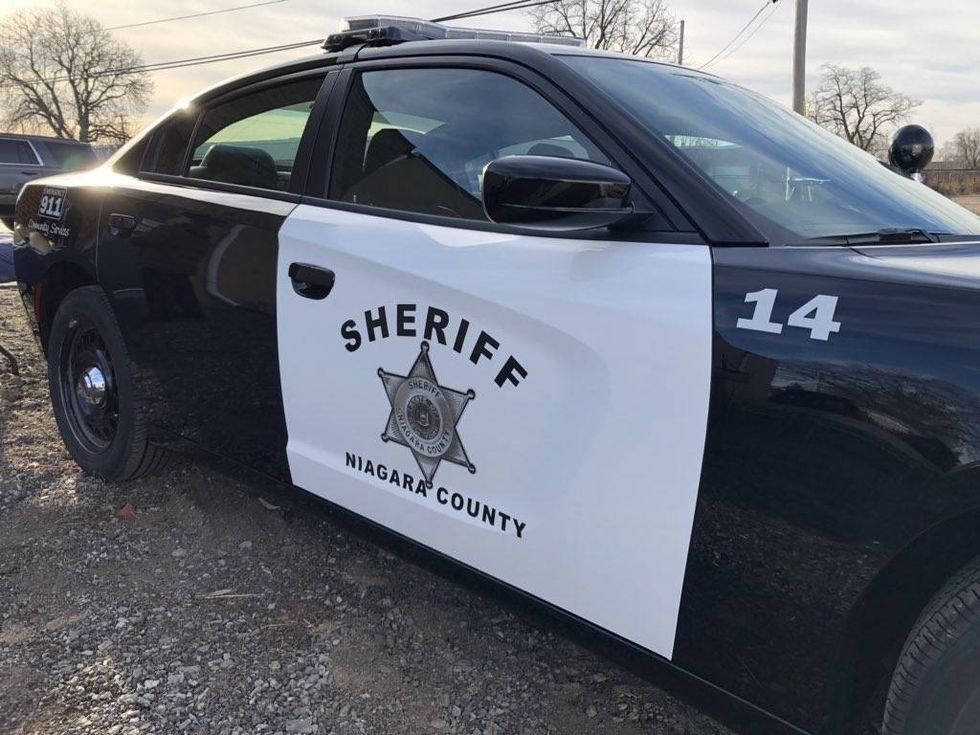 Car collides with school bus in Royalton; driver hospitalized