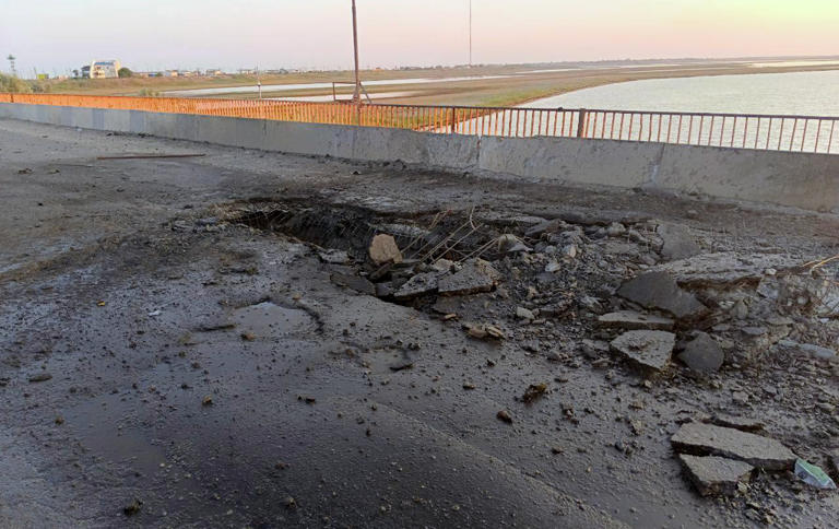 Key bridge linking Crimea to mainland Ukraine shut down after strike