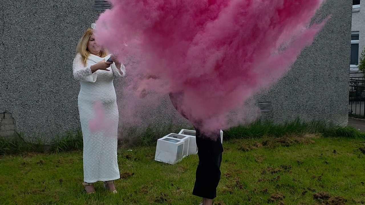 Gender reveal party features football kick that unleashes pink confetti ...