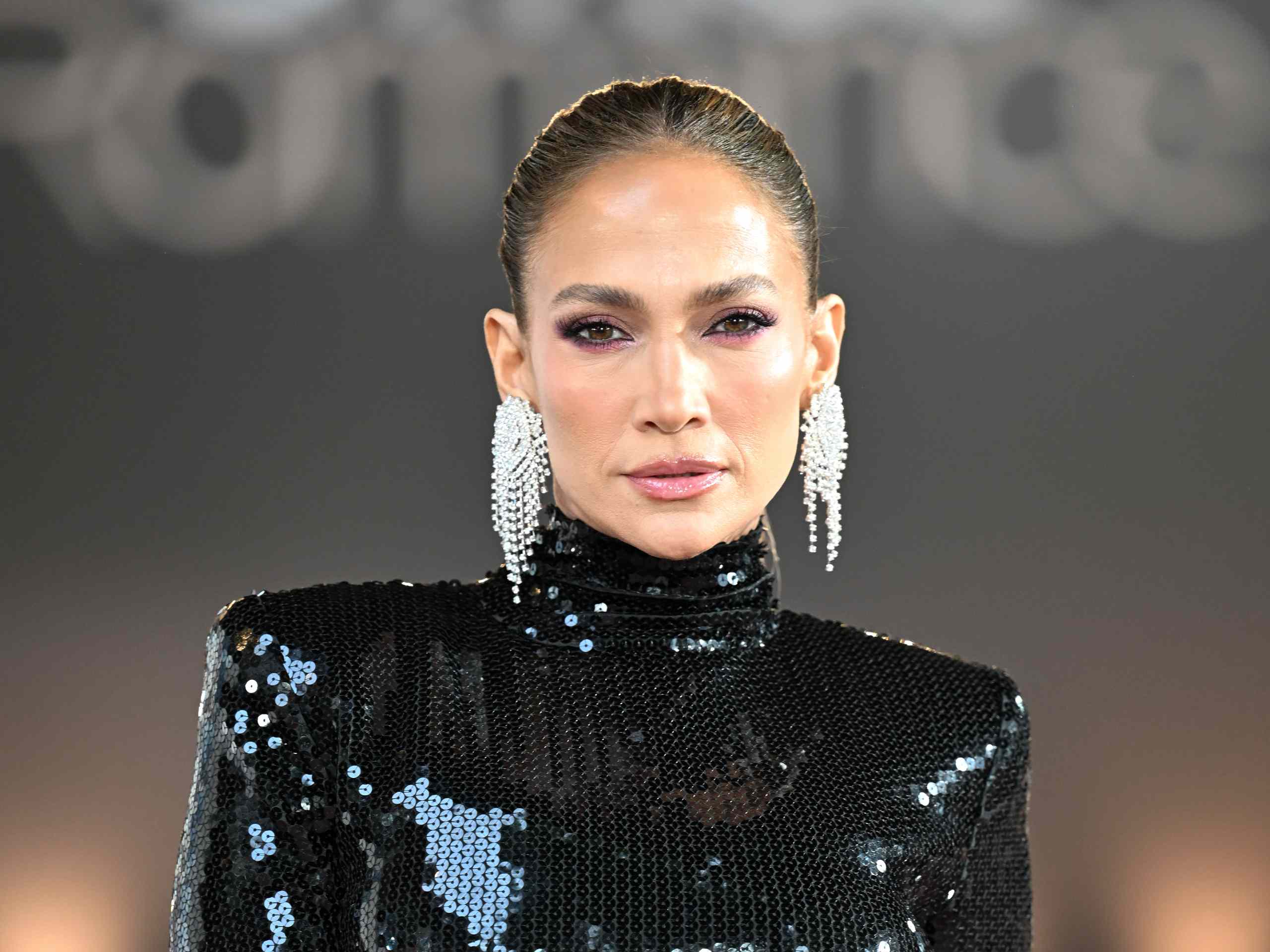 Jennifer Lopez wipes away tears as she watches son Max graduate from ...