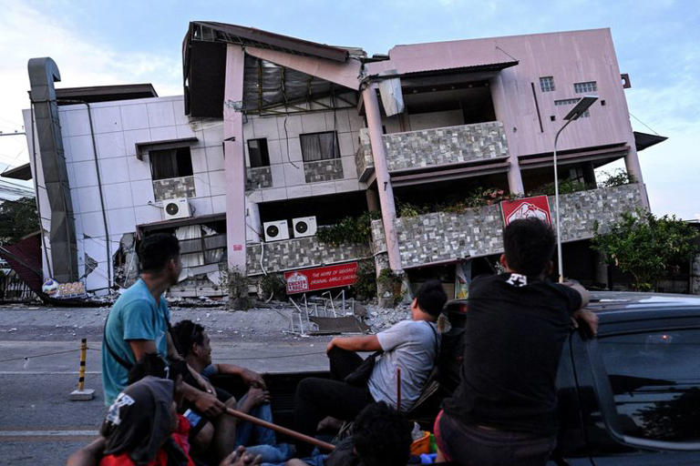 Rescuers race to reach trapped after powerful quake in southern Philippines