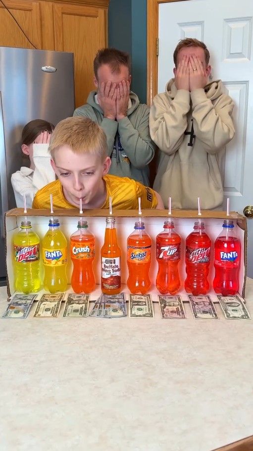 Family soda game with dad and kids