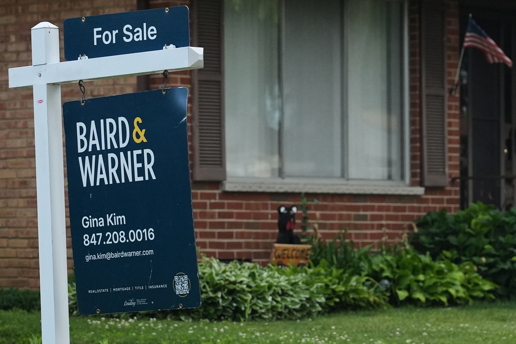 US home sales surge to the fastest pace this year despite rising ...