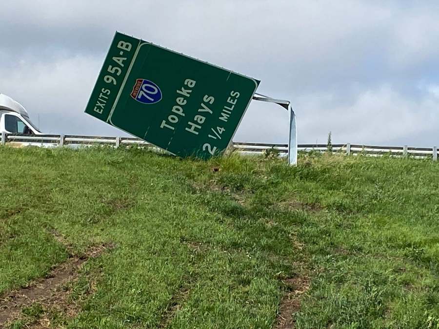 Destructive severe storm winds bend, break road signs in Kansas