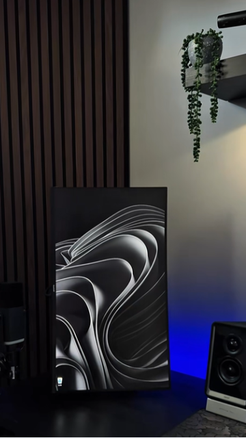 Clean blue and black gaming setup