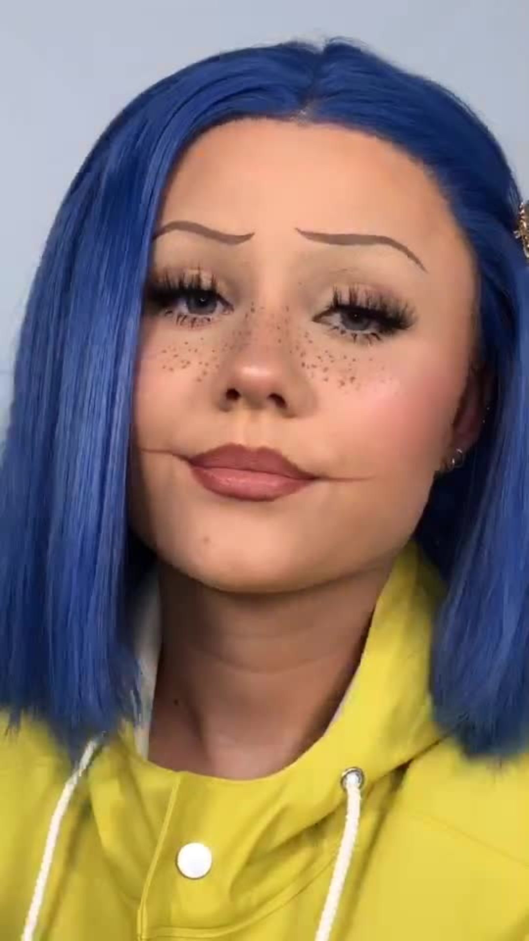 Behind the scenes of a Coraline makeup transformation