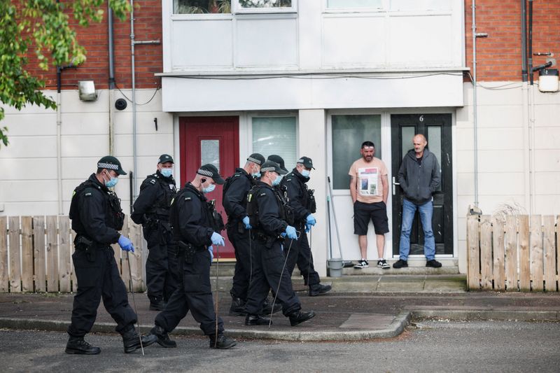 Northern Ireland police appeal for calm after 'barbaric' knife attack ...