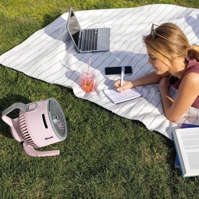 This new portable mini fan comes with its own cooling mist