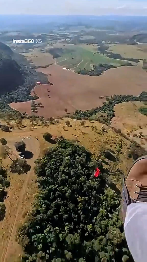 Pilot filmed horrific moment paraglider crashed and plummeted to his death
