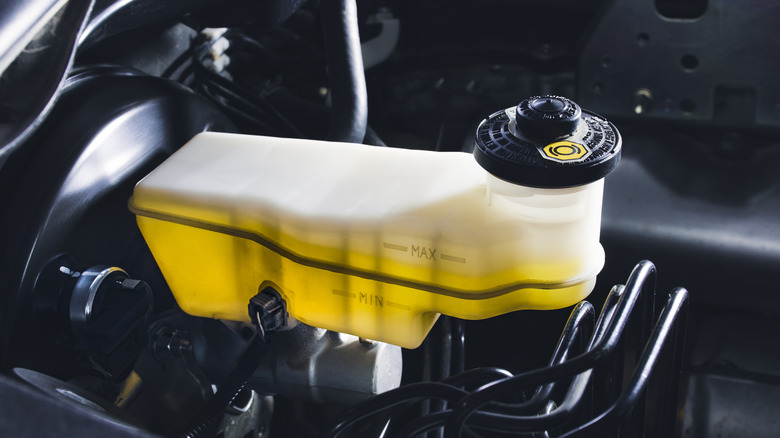 7 signs and causes of low brake fluid (and what happens when you run out)
