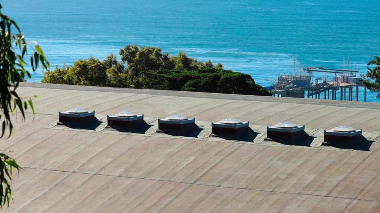 Vista company using more natural daylight and less electricity to light ...