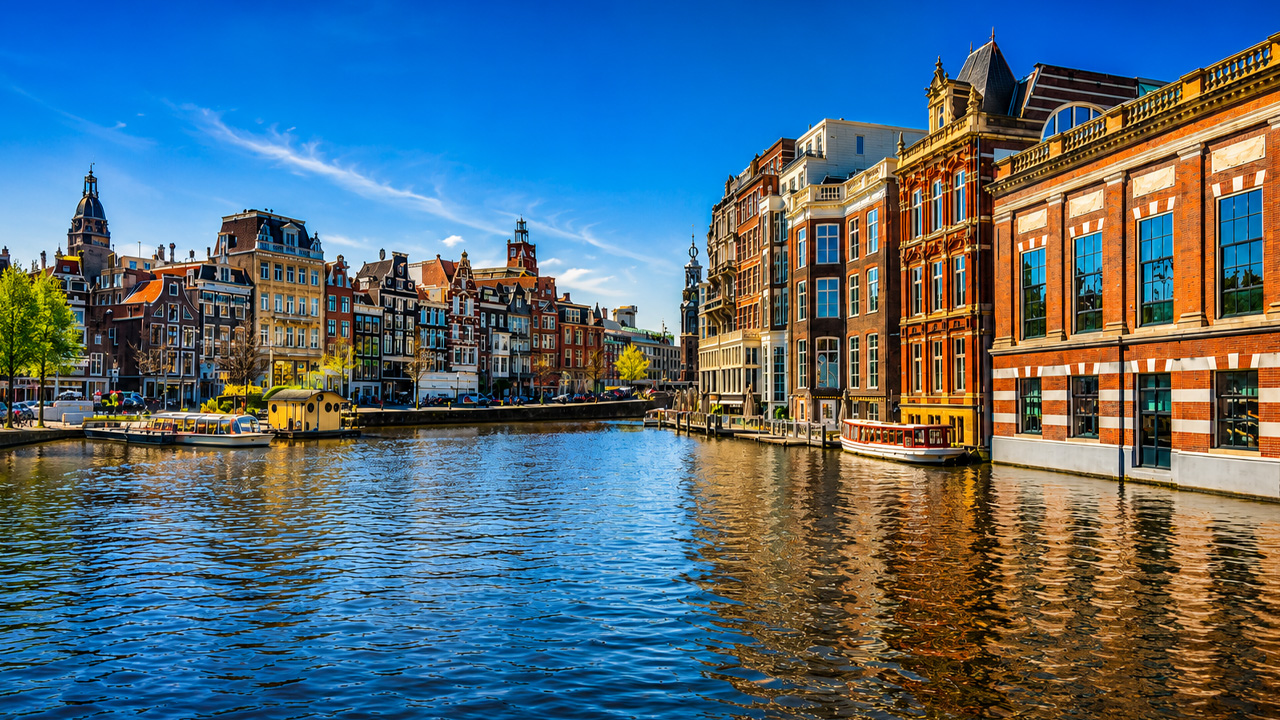 Amsterdam spring canal walk with sunny historic views