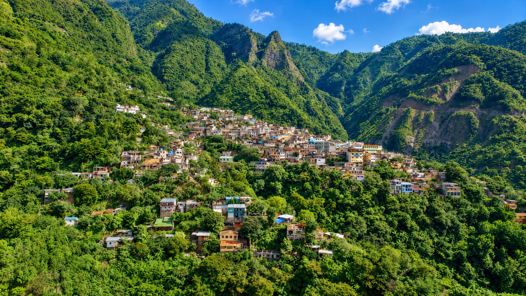 A hillside village rising above Guatemala’s Lake Atitlán