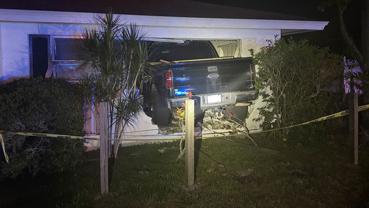 Manatee County man pinned under truck after vehicle slams into home: FHP