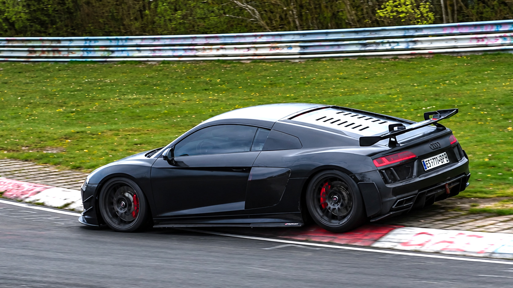 Audi R8 goes off track after losing control