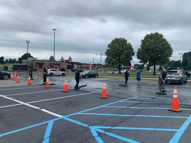 U-Haul van catches on fire in shopping center parking lot