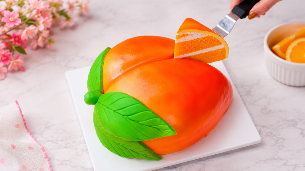 Mango shaped cake with orange layers