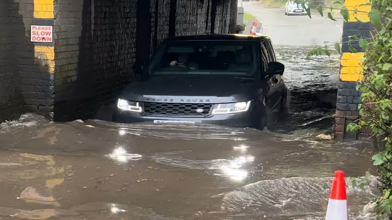 Driver takes a $100,000 gamble in flooded tunnel