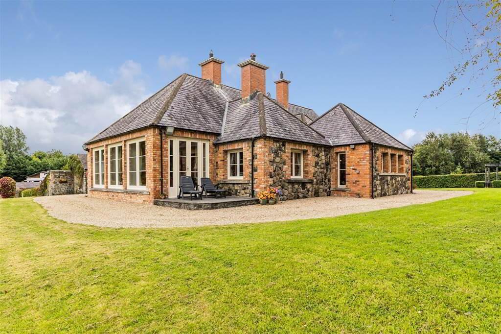 This magnificent stone built country home with stables, quaint guest ...