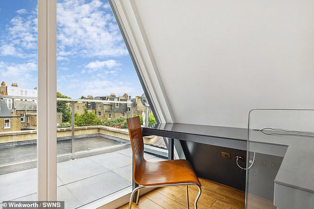 Slight-move! London home barely wider than a Tube carriage goes on sale ...