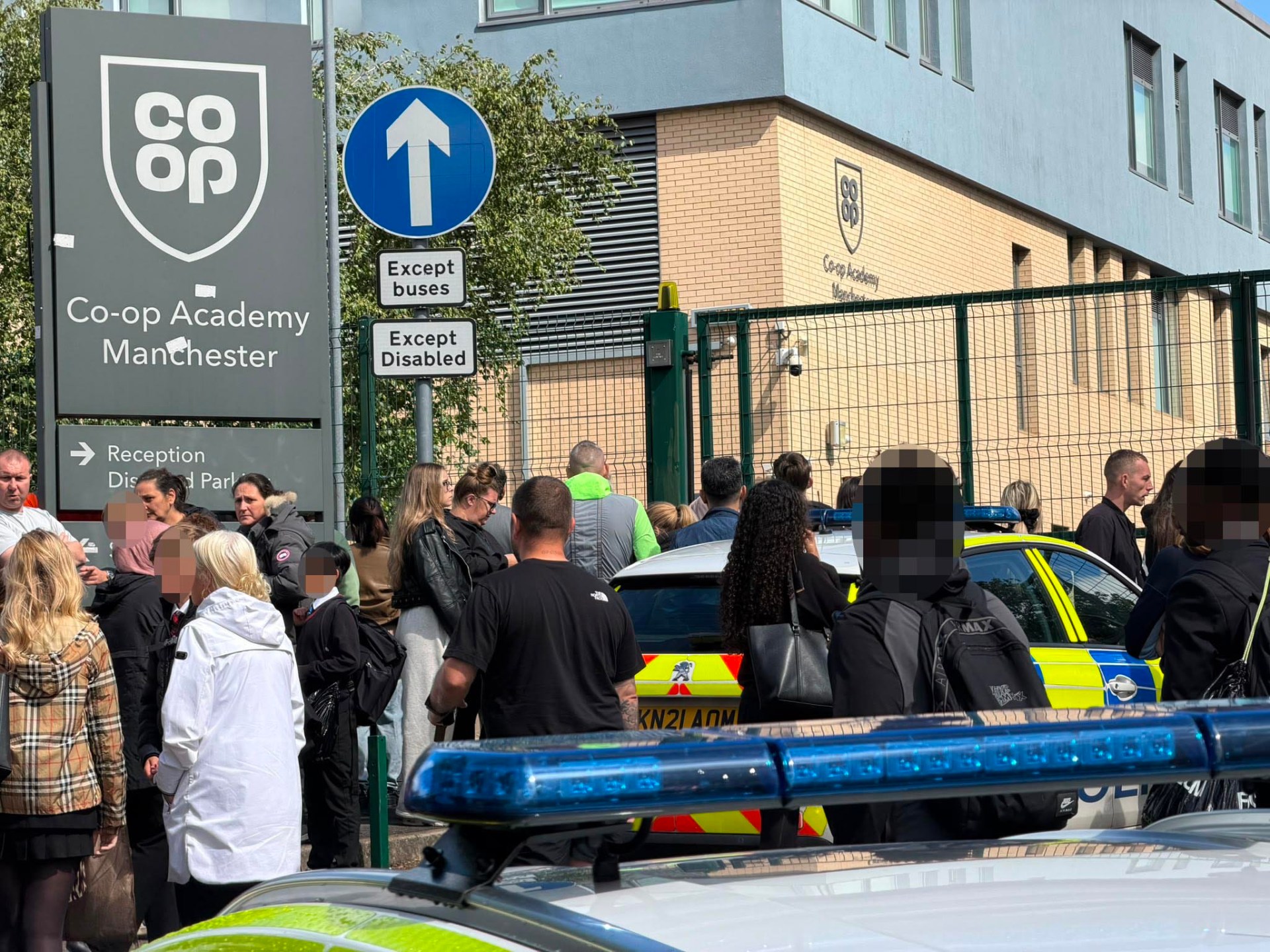 Girl, 14, arrested after two pupils and teacher stabbed at Manchester ...