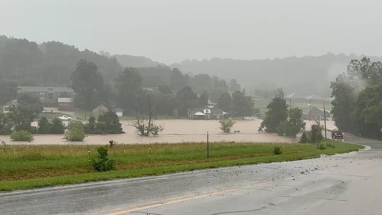 RAW: Propane tank rolls through flooding in downtown Lanesville