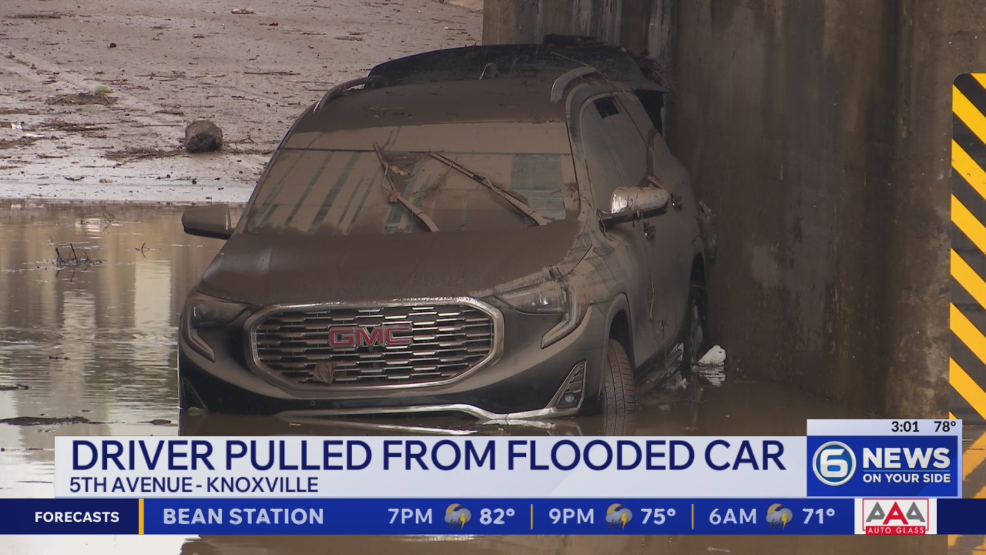 Receding water reveals car that had been submerged in Knoxville flooding
