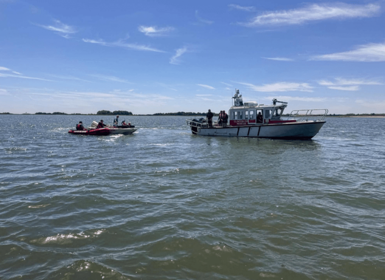 Photos: Children, adults rescued after boat engine trouble in Clinton