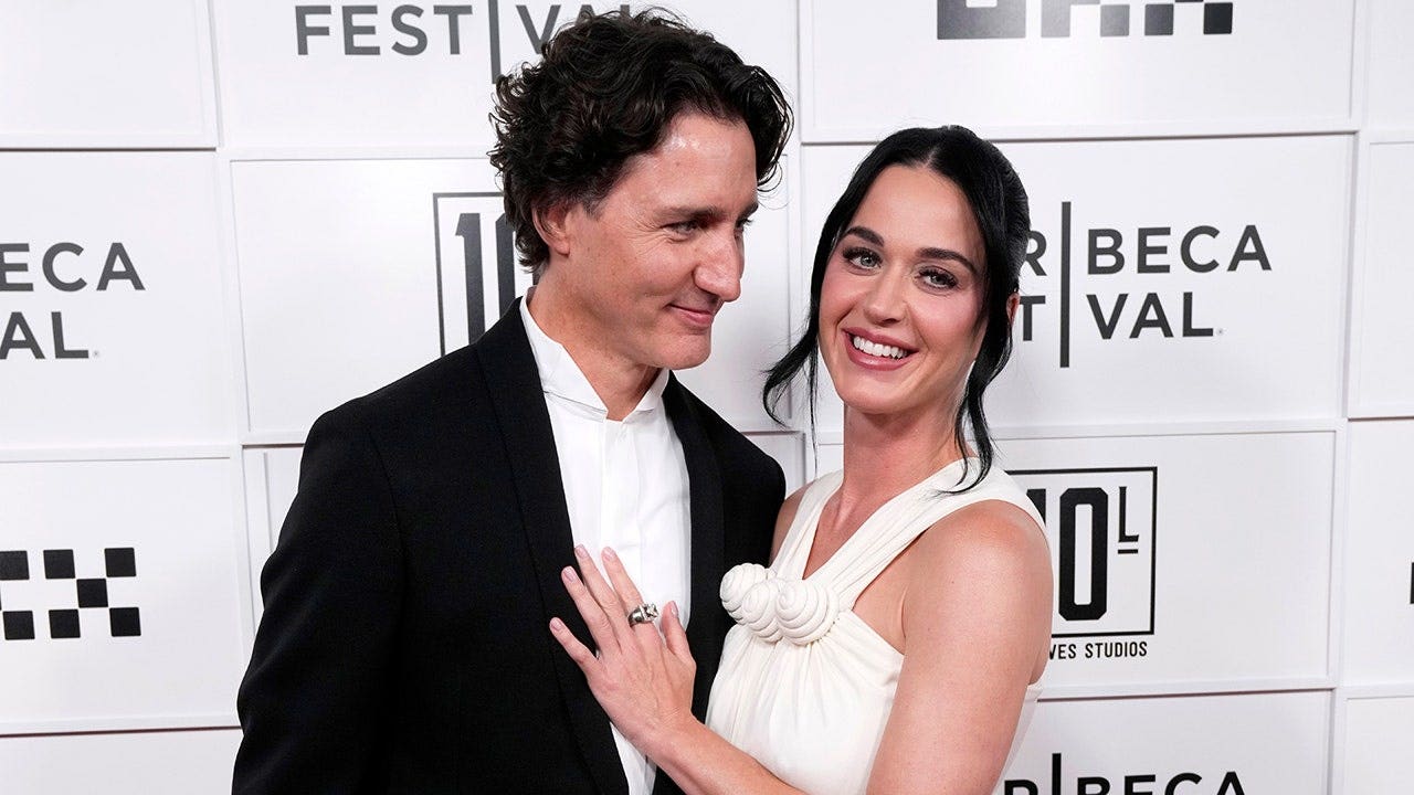 Katy Perry and Justin Trudeau pack on the PDA in affectionate red ...