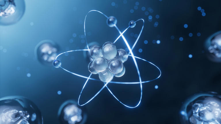 Why does NASA need to use atomic clocks in space?